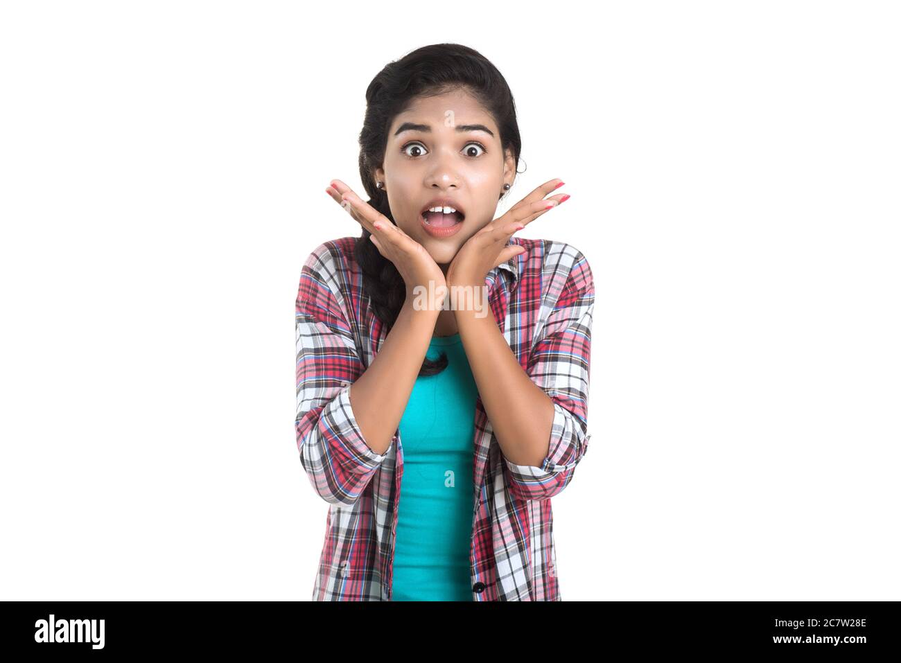 Beautiful girl surprised and shocked. Expressive facial expressions ...