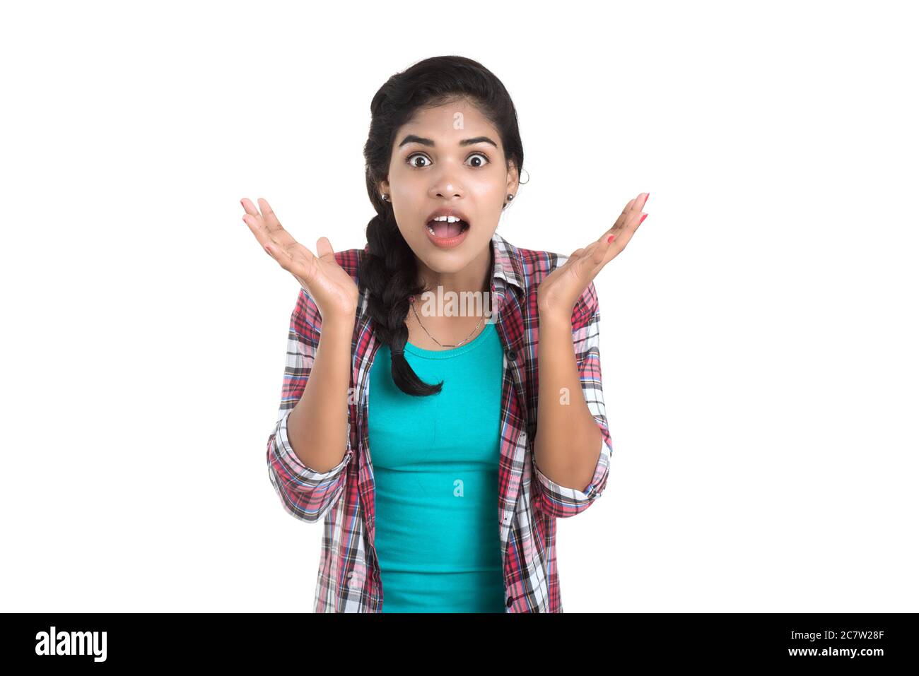 Beautiful girl surprised and shocked. Expressive facial expressions ...