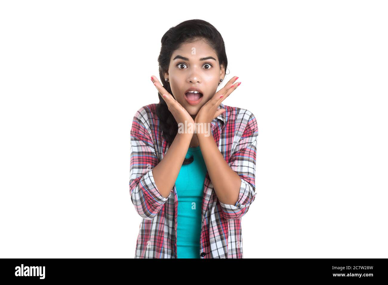 Beautiful girl surprised and shocked. Expressive facial expressions ...