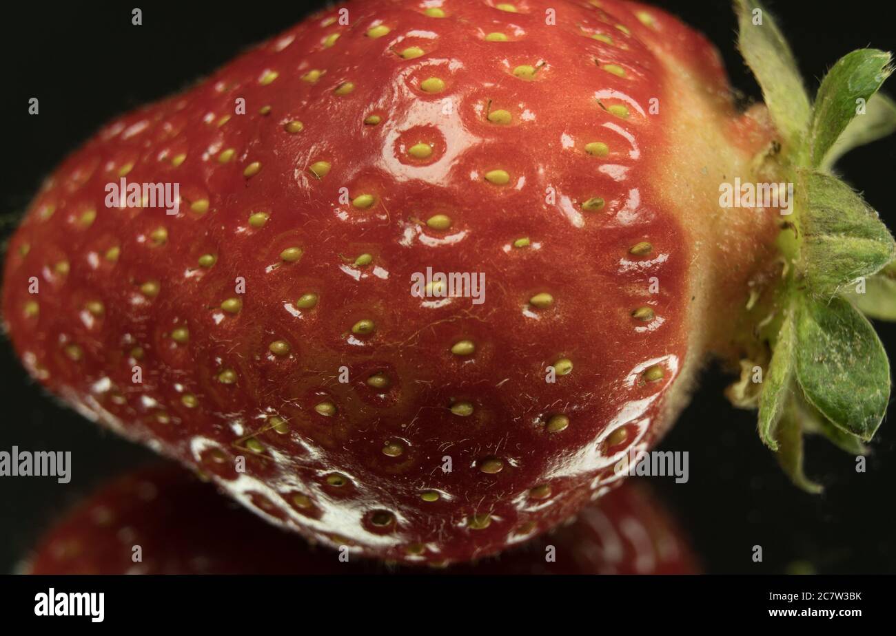 Strawberry berries close up. Visible structure and small details. Small ...