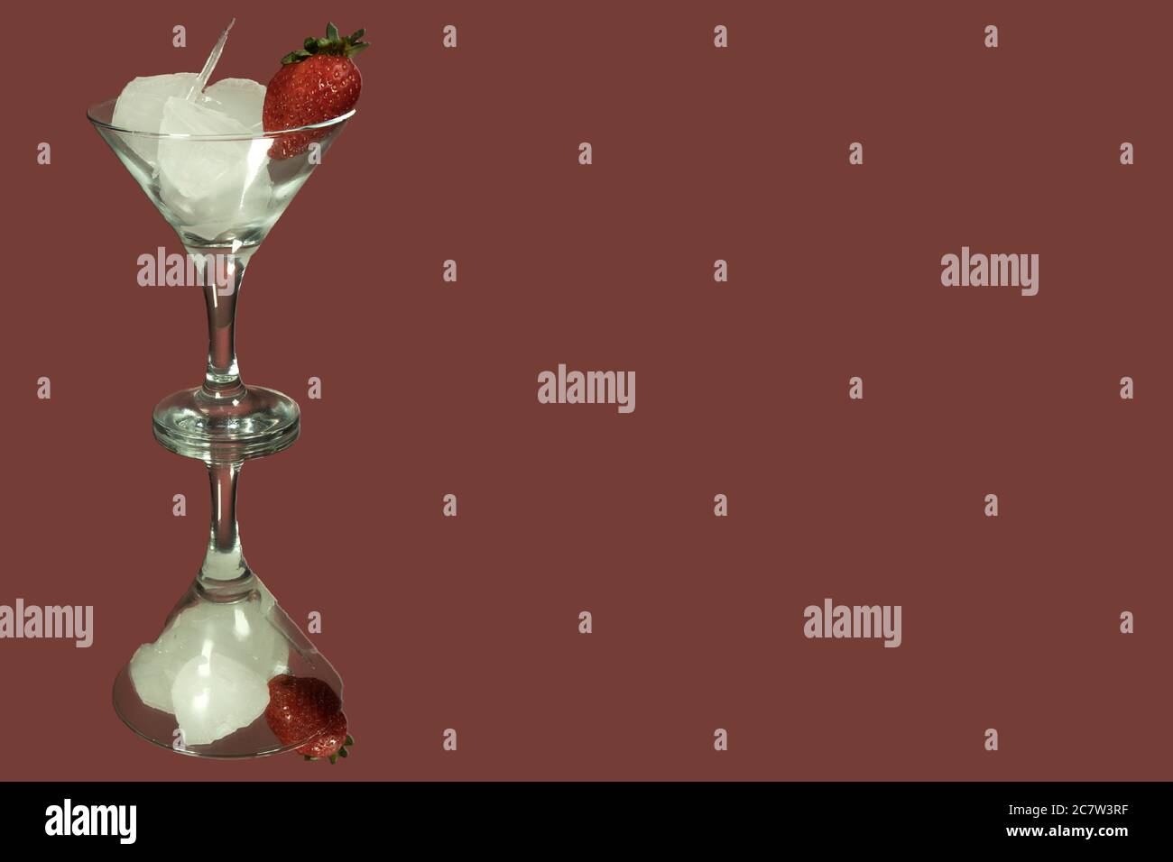 Frozen strawberry daiquiri alcohol cocktail. Isolated on red background ...