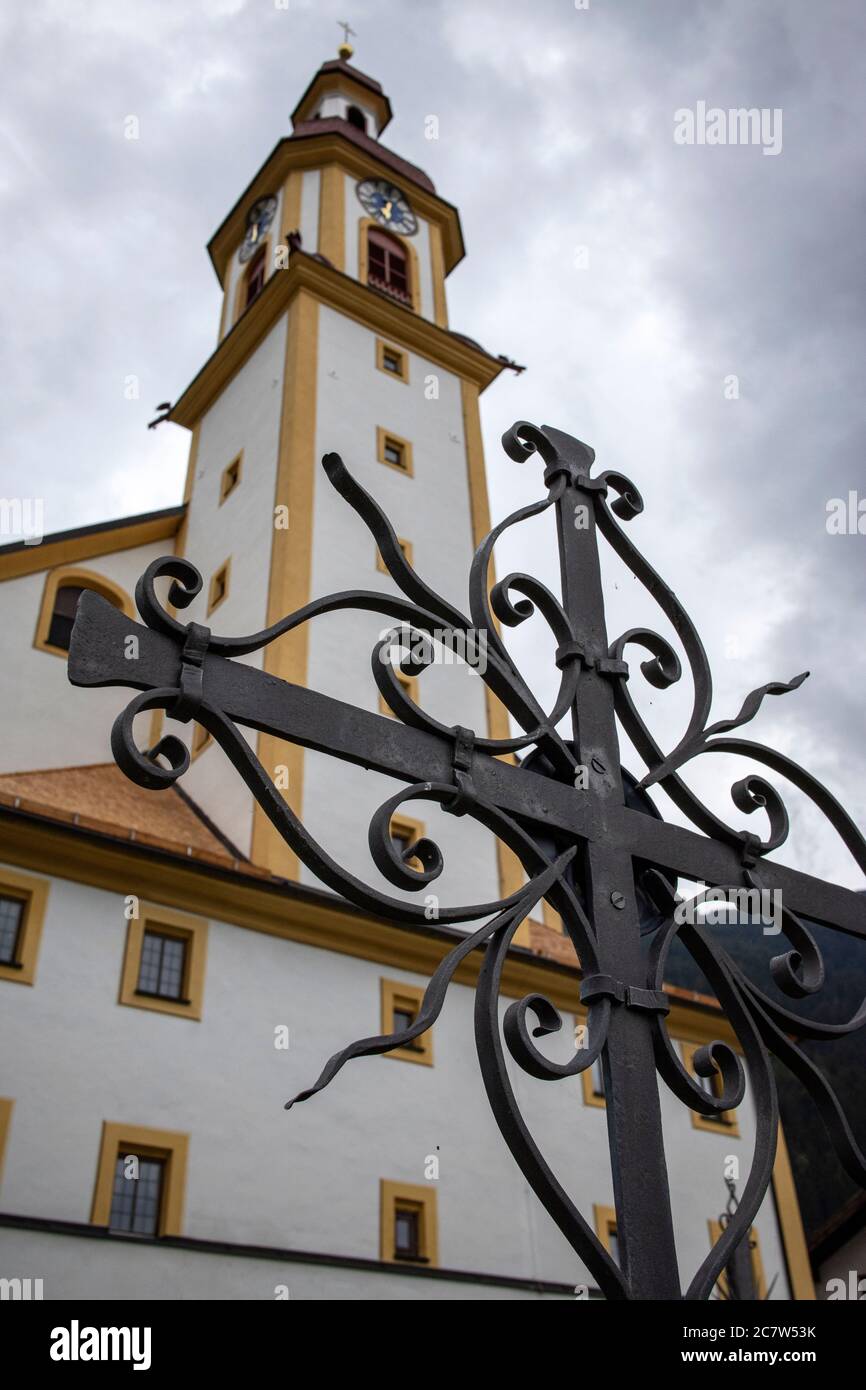 cross and a church Stock Photo - Alamy