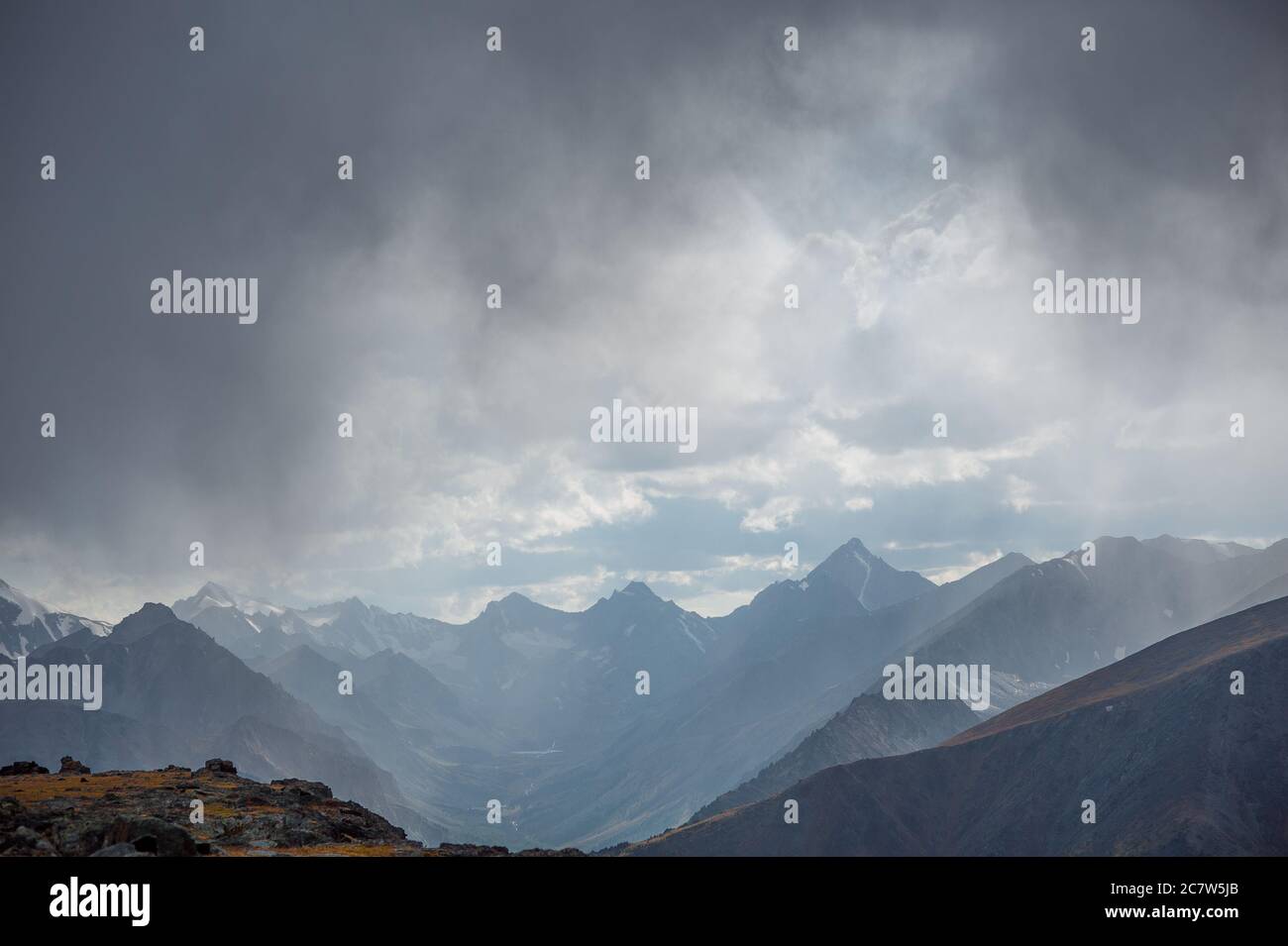 Snowy mountains storm clouds hi-res stock photography and images - Alamy