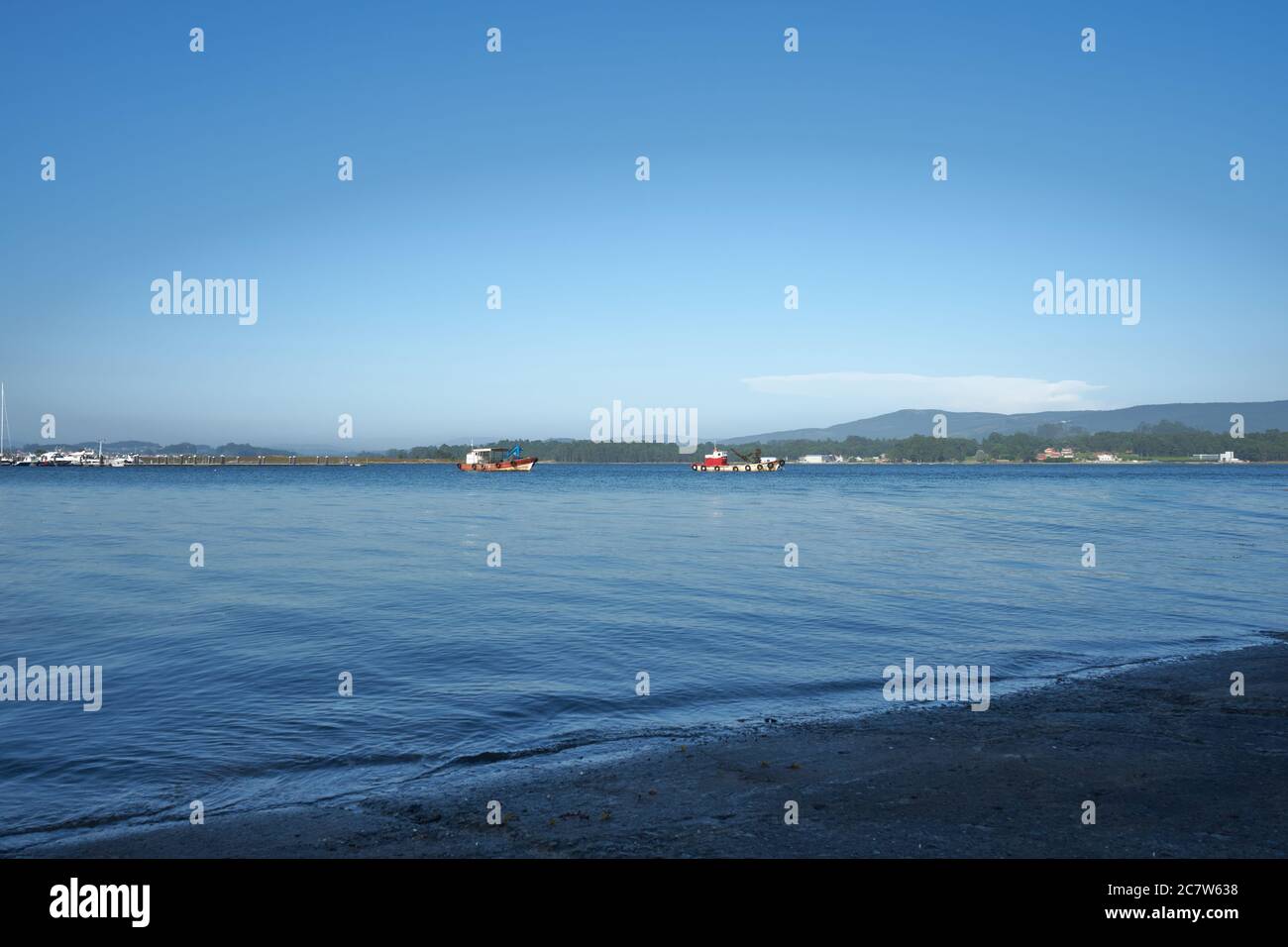 Fishing boats on La Toja Island Stock Photo - Alamy