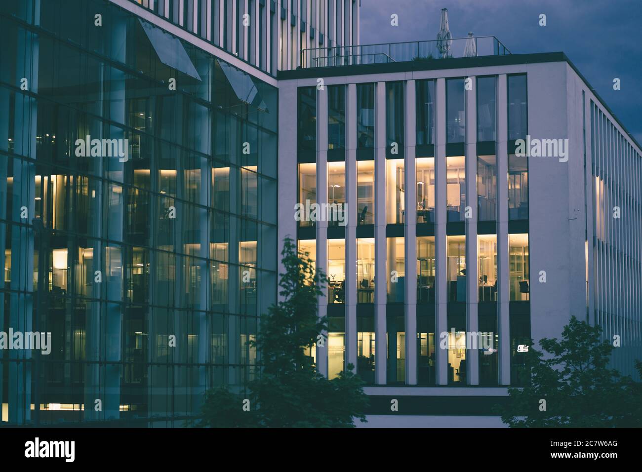 MUNICH, GERMANY - Jun 30, 2020: The PWC office building illuminates at ...