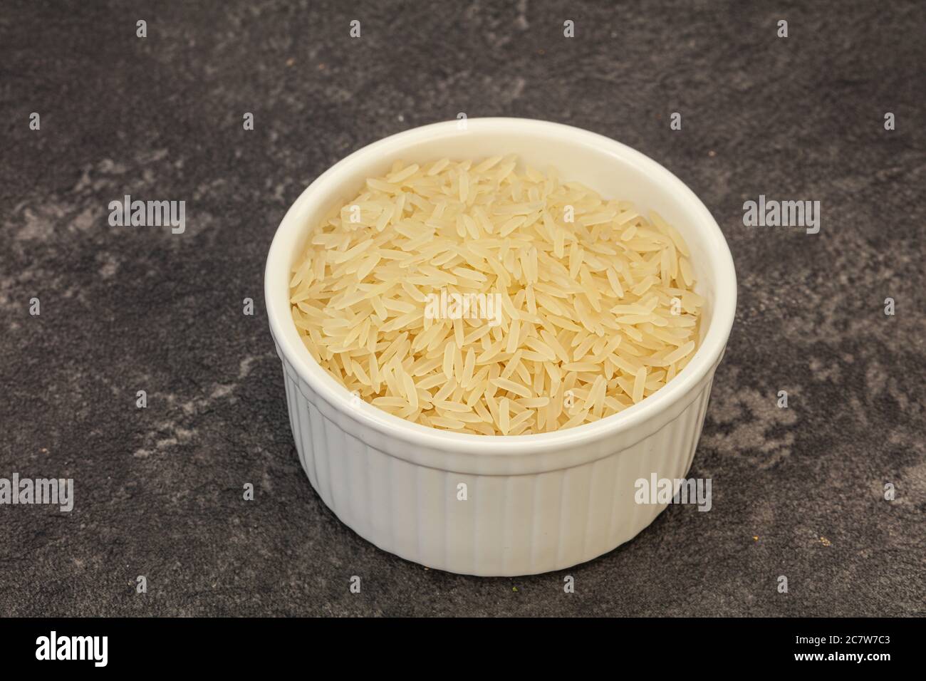 Raw Indian basmati rice in the bowl Stock Photo - Alamy