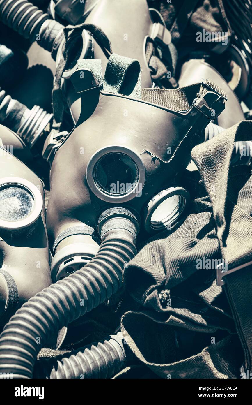 Close up background of old vintage protective gas respirator masks on ...