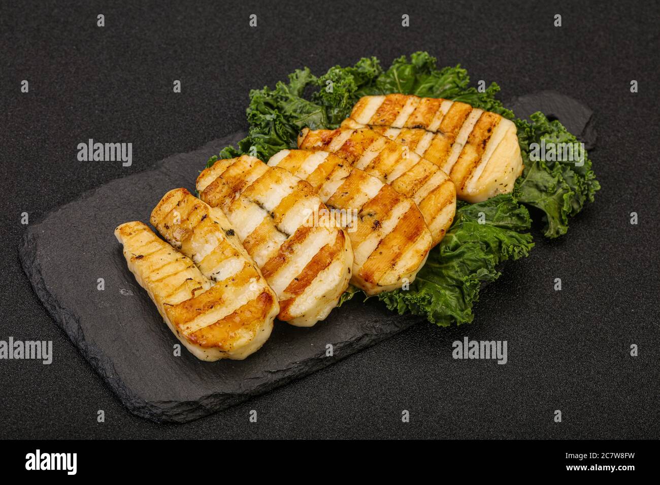Grilled Greek haloumi cheese with herbs and spices Stock Photo - Alamy