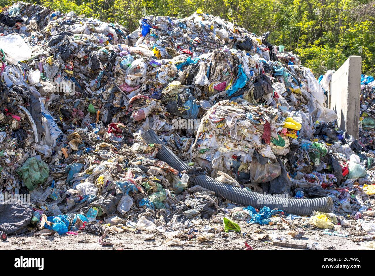 Pile of municipal waste on a disposal site - environmental pollution ...