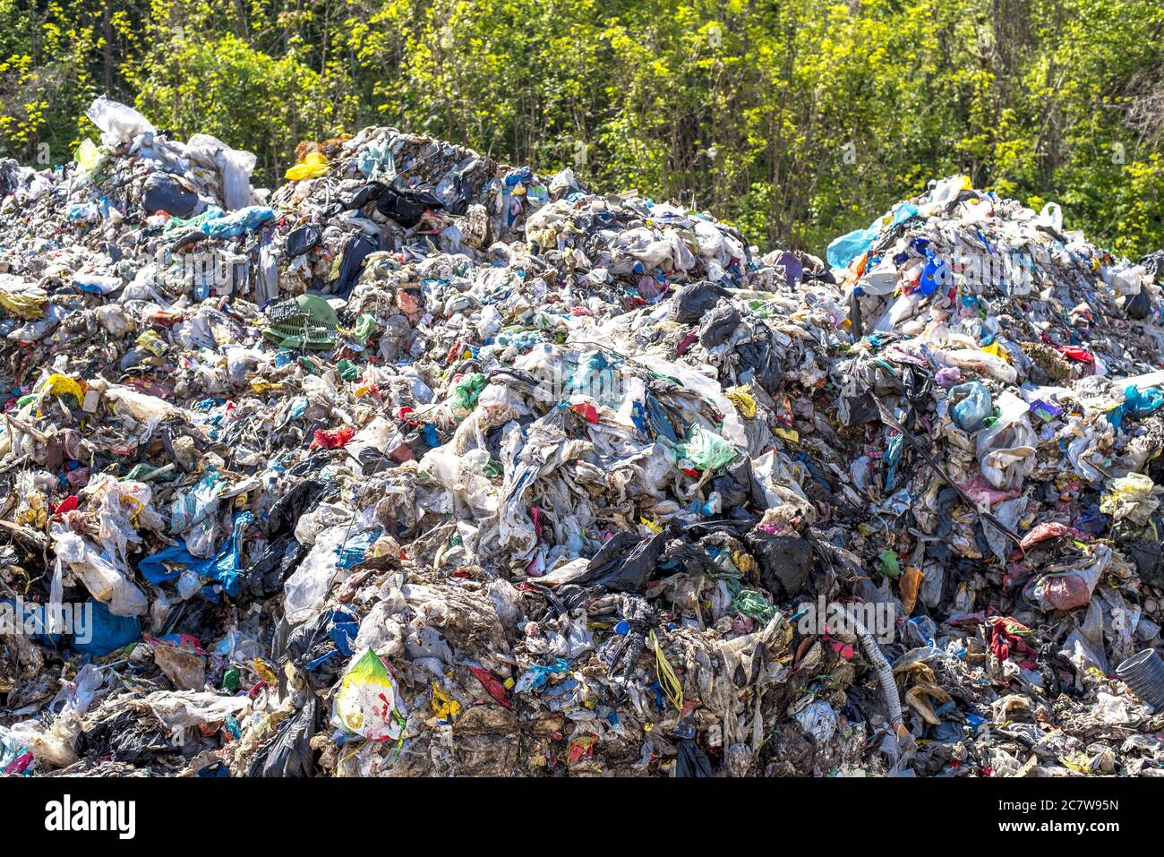 Pile of municipal waste on a disposal site - environmental pollution ...