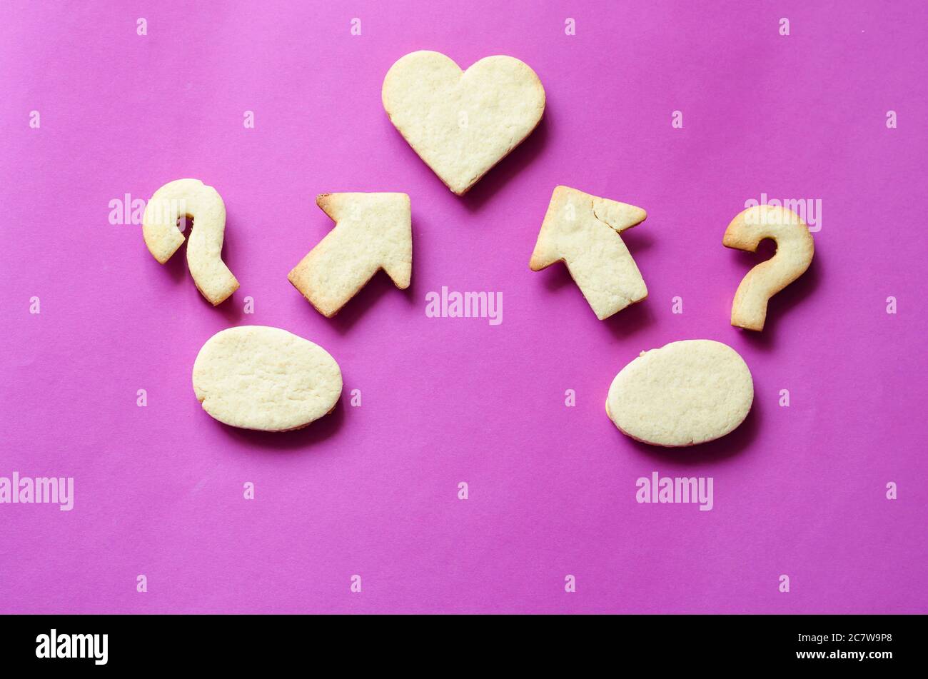 Creative background Homemade shortbread cookies. Heart symbol, arrows ...