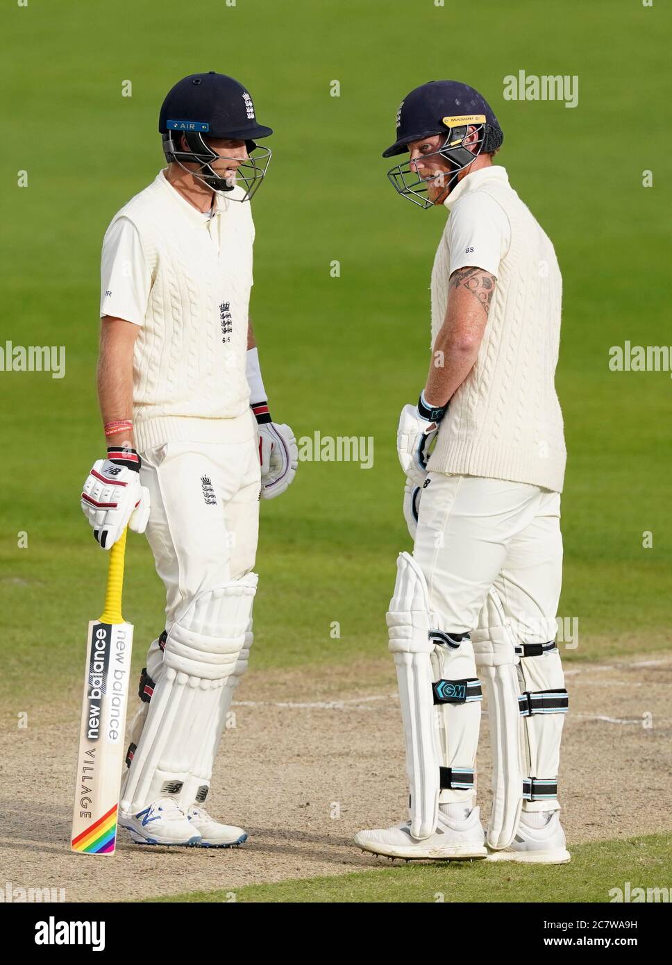 England's Ben Stokes (right) and Joe Root during day four of the Second ...