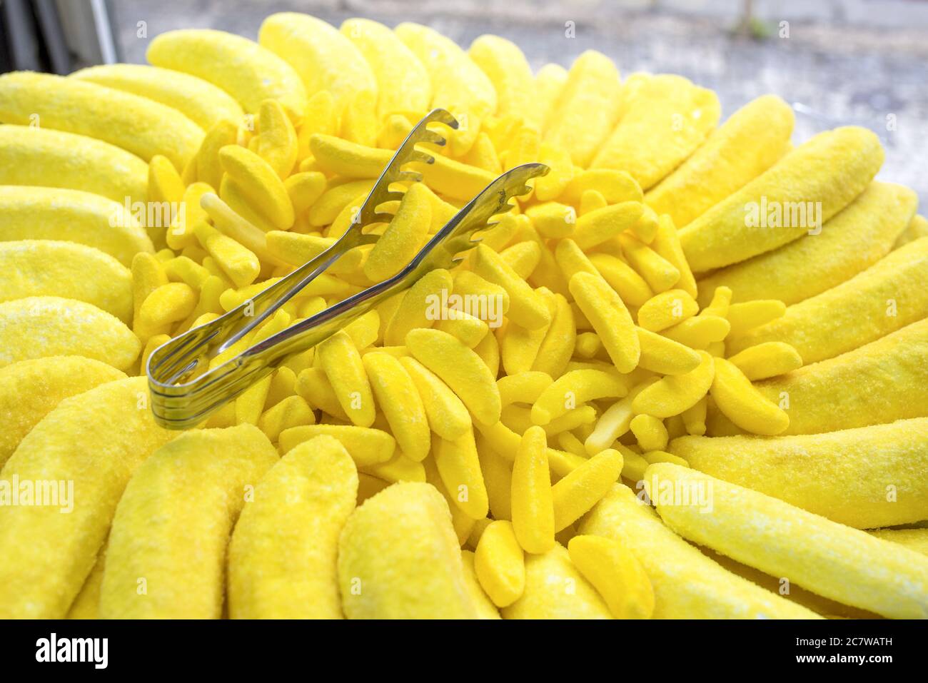Closeup shot of sweet yellow candy in a pastry shop Stock Photo - Alamy