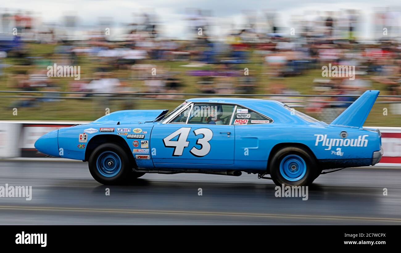 Plymouth Superbird accelerating away from the start line at Santa Pod ...