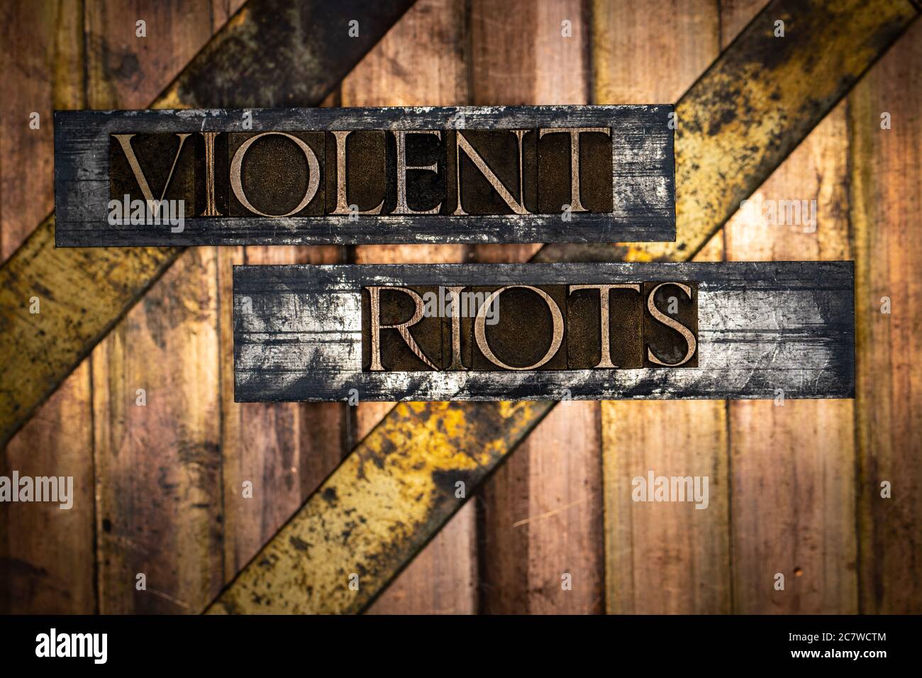 Violent Riots text formed with real authentic typeset letters on ...