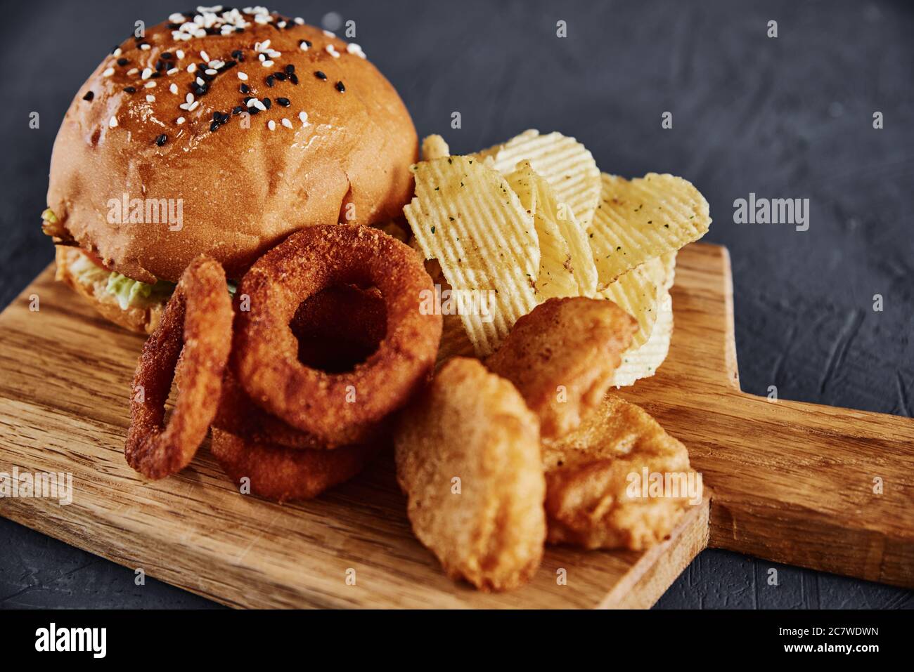 Unhealthy and junk food. Different types of fast food on the table ...