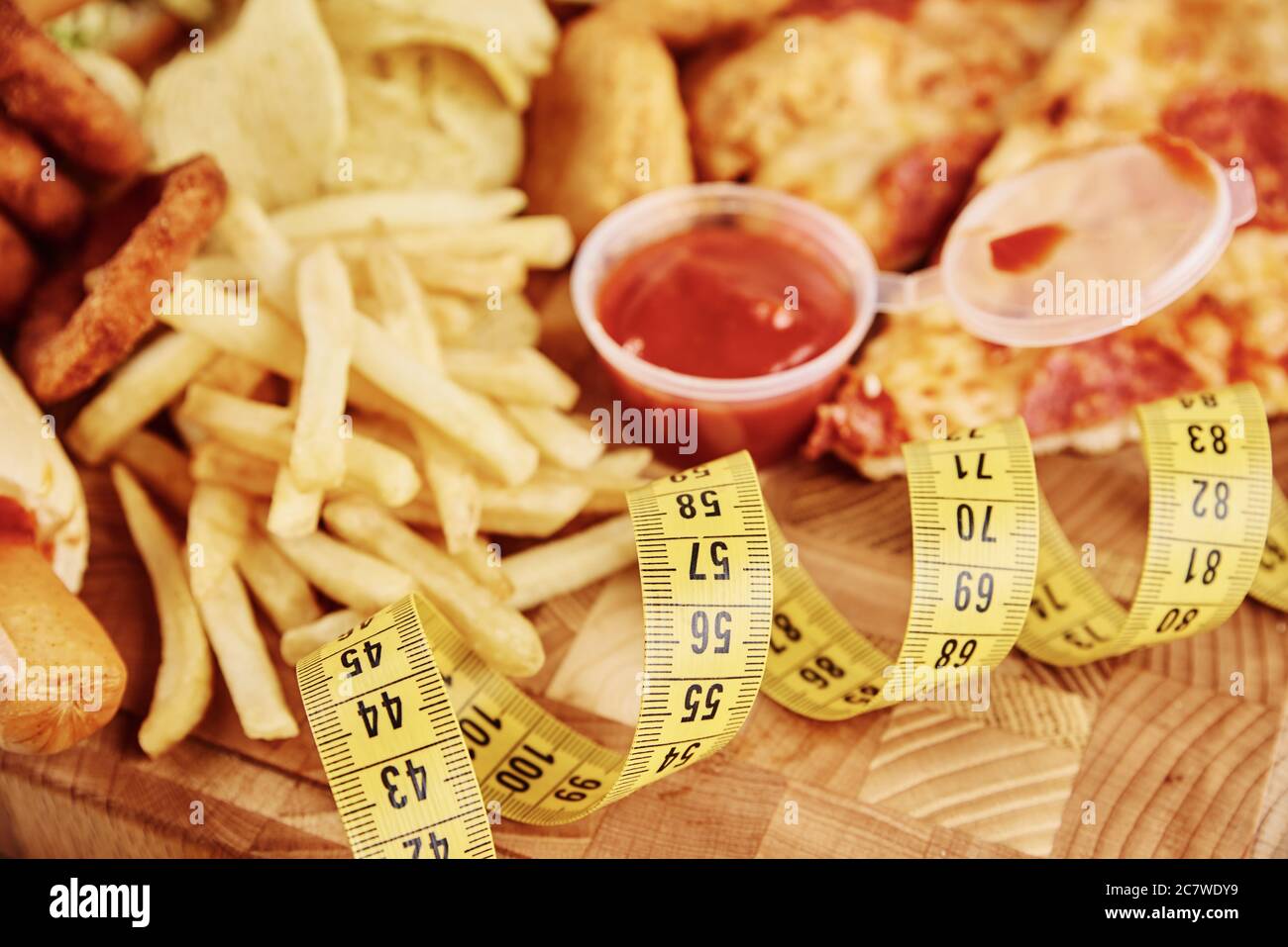 Unhealthy and junk food. Different types of fastfood and snacks on ...
