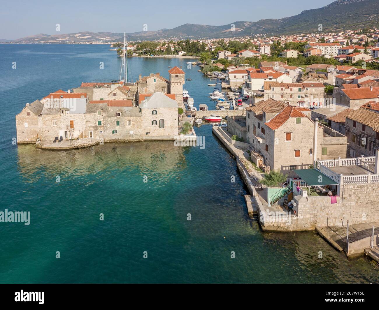 Split, Croatia - August 19 2019: Aerial view, old castle Kaštel Gomilica near Split, Croatia on ...