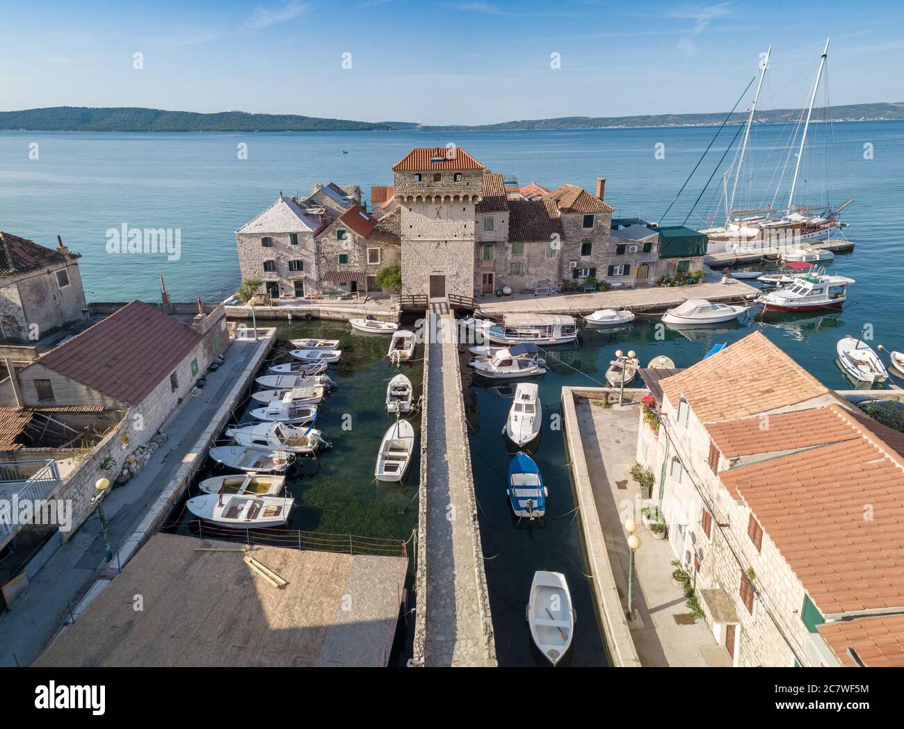 Split, Croatia - August 19 2019: Aerial view, old castle Kaštel Gomilica near Split, Croatia on ...