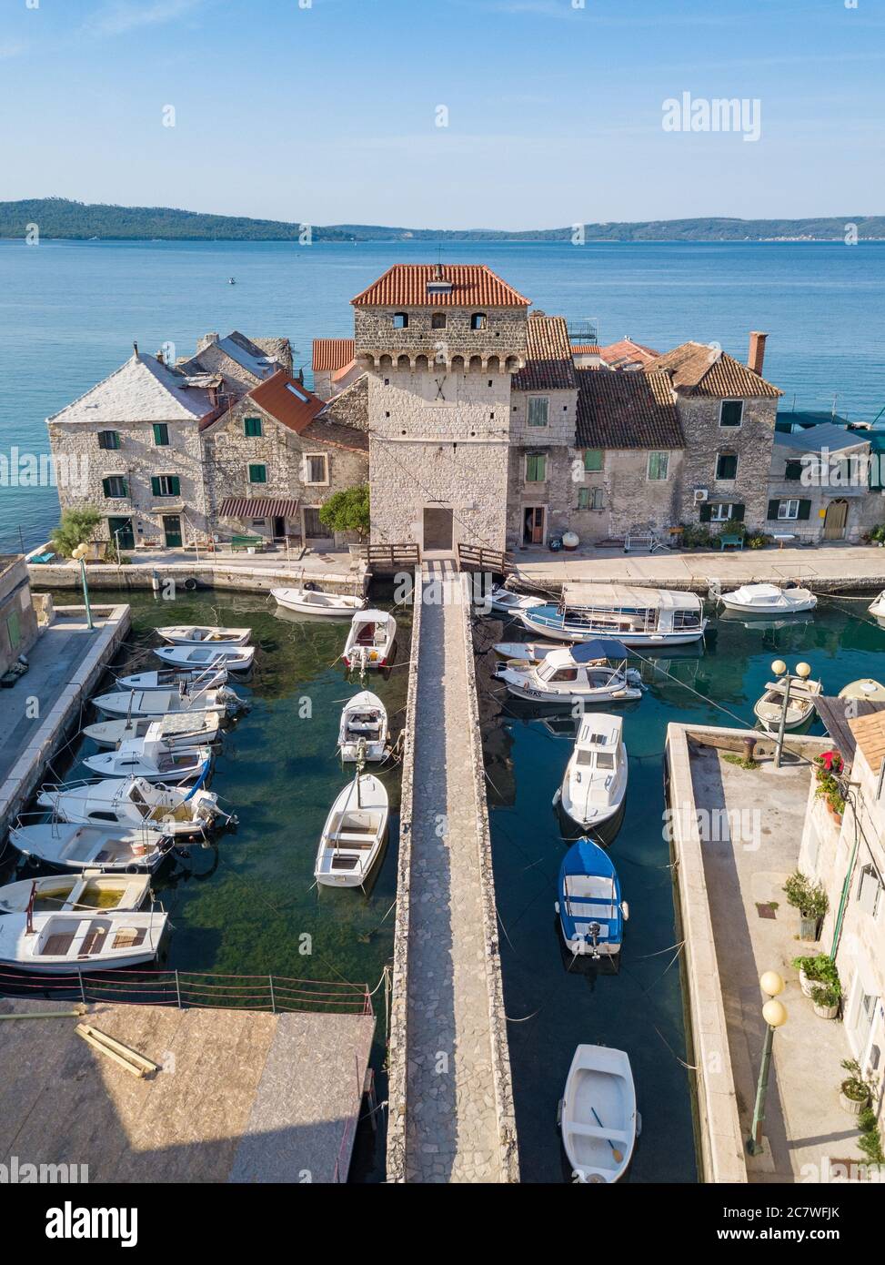Split, Croatia - August 19 2019: Aerial view, old castle Kaštel Gomilica near Split, Croatia on ...