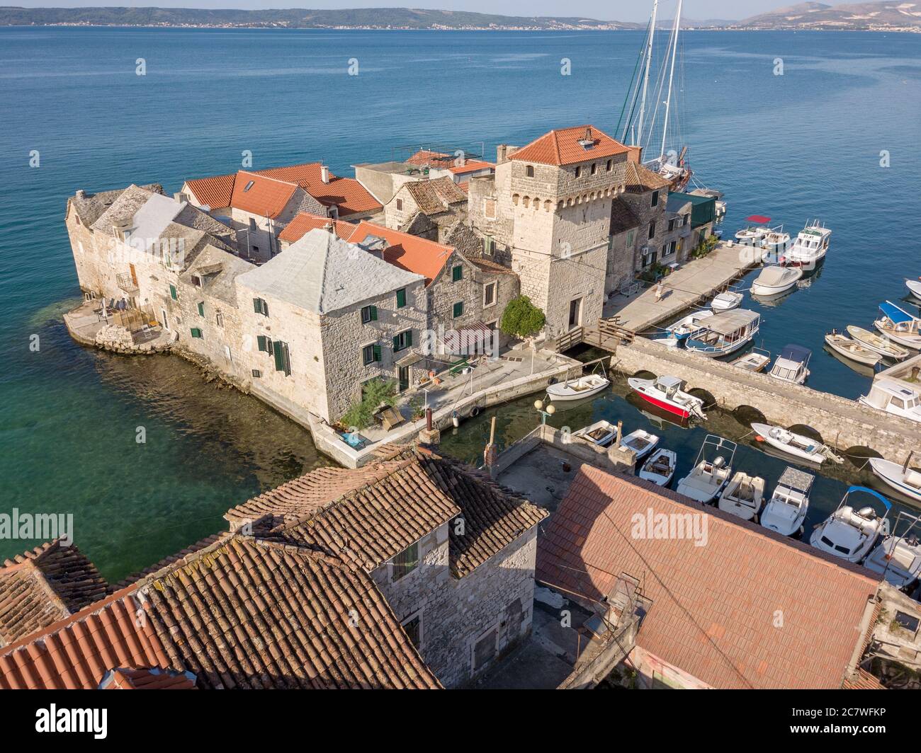Split, Croatia - August 19 2019: Aerial view, old castle Kaštel Gomilica near Split, Croatia on ...