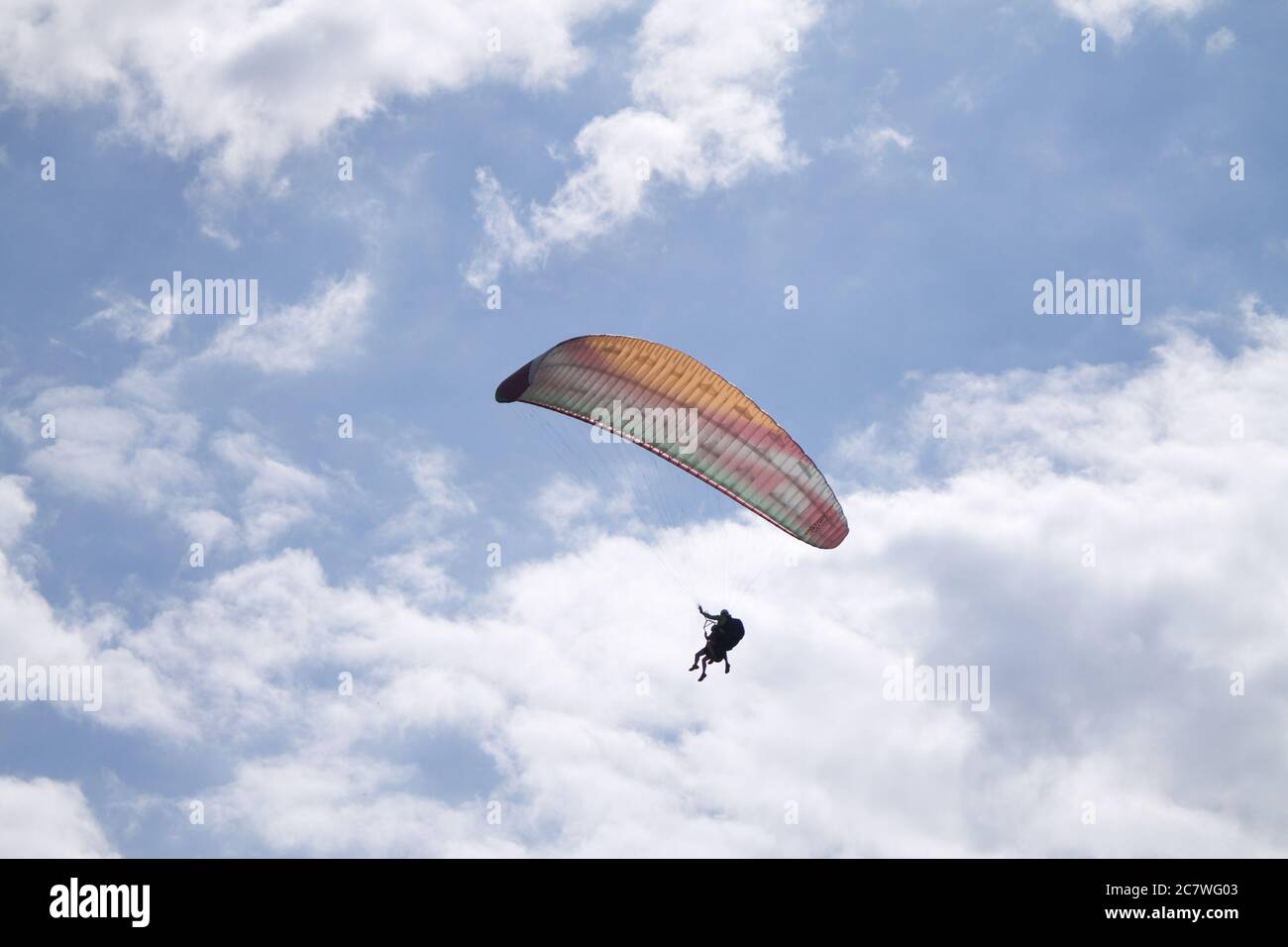 Person flying on paraplane hi-res stock photography and images - Alamy