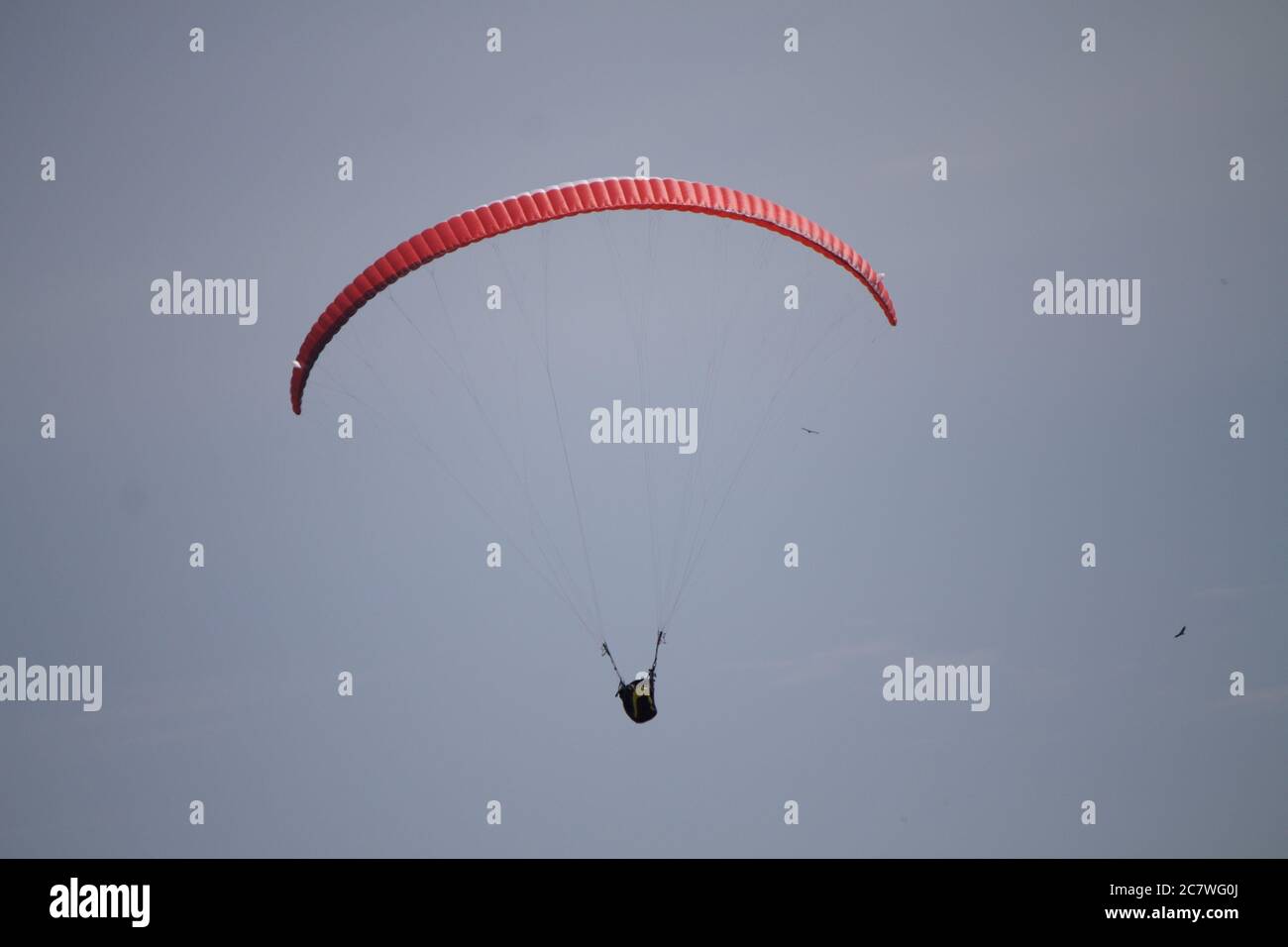 Person flying on paraplane hi-res stock photography and images - Alamy