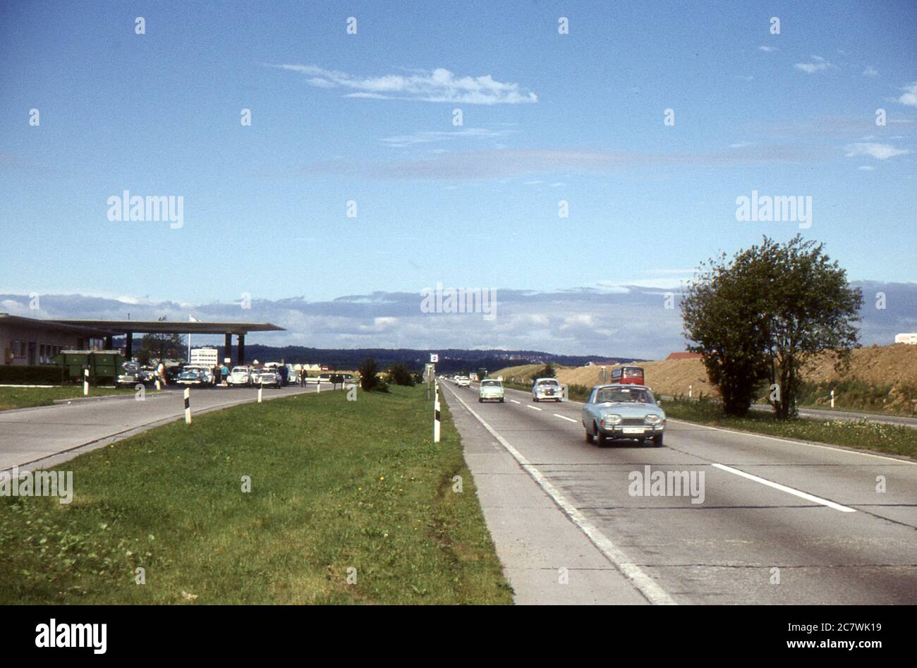 Germany. 1963. A service station on a German autobahn, where several ...