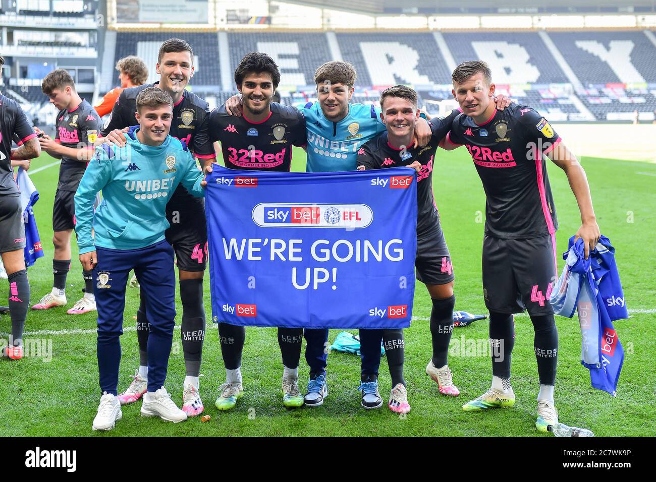Leeds United players celebrate as they are promoted to the Premier ...