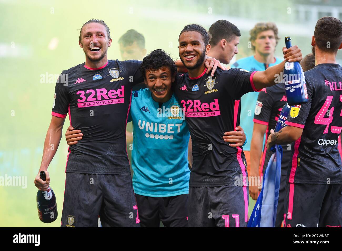 Leeds United players celebrate as they are promoted to the Premier ...