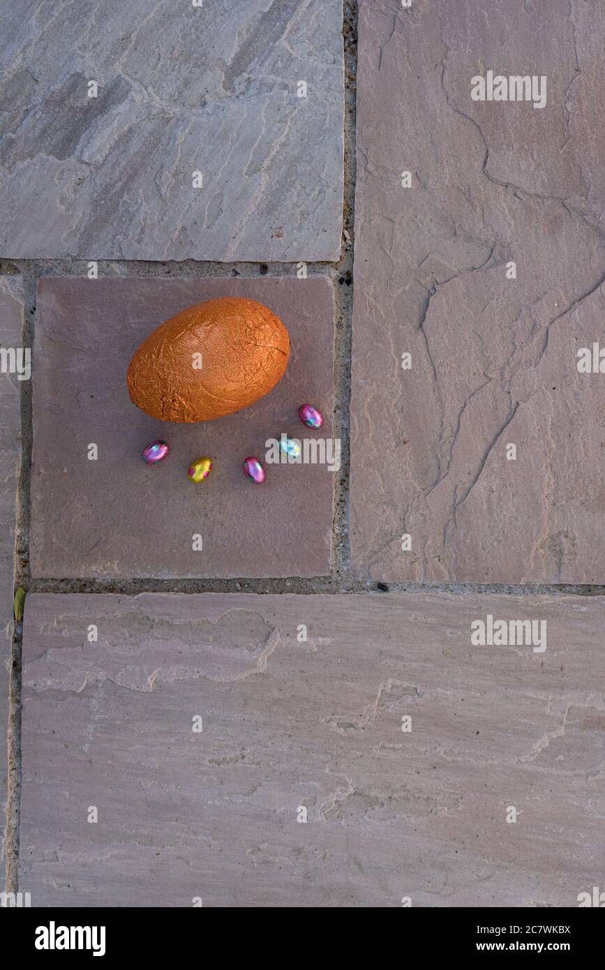 Easter eggs on patio with space with negative space to one side Stock ...