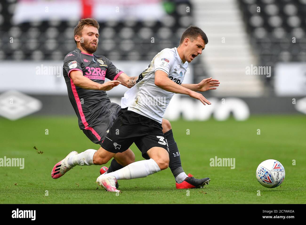 Stuart Dallas (15) of Leeds United fouls Jason Knight (38) of Derby ...