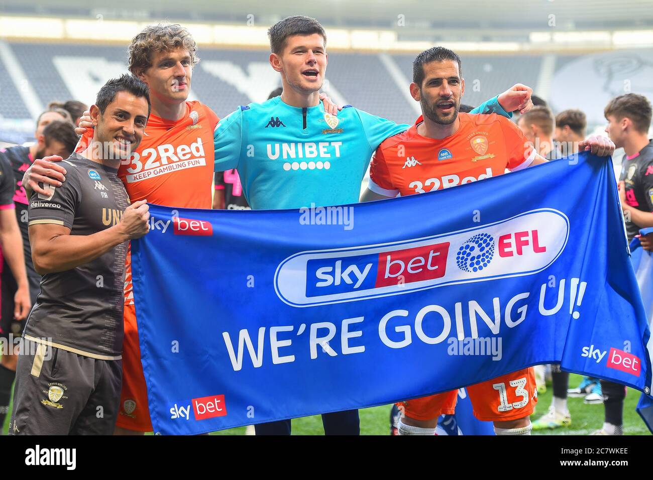 Leeds United players celebrate as they are promoted to the Premier ...