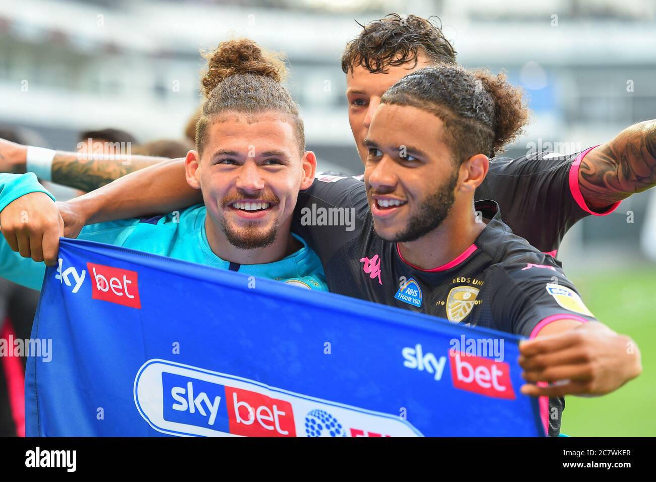 Leeds United players celebrate as they are promoted to the Premier ...