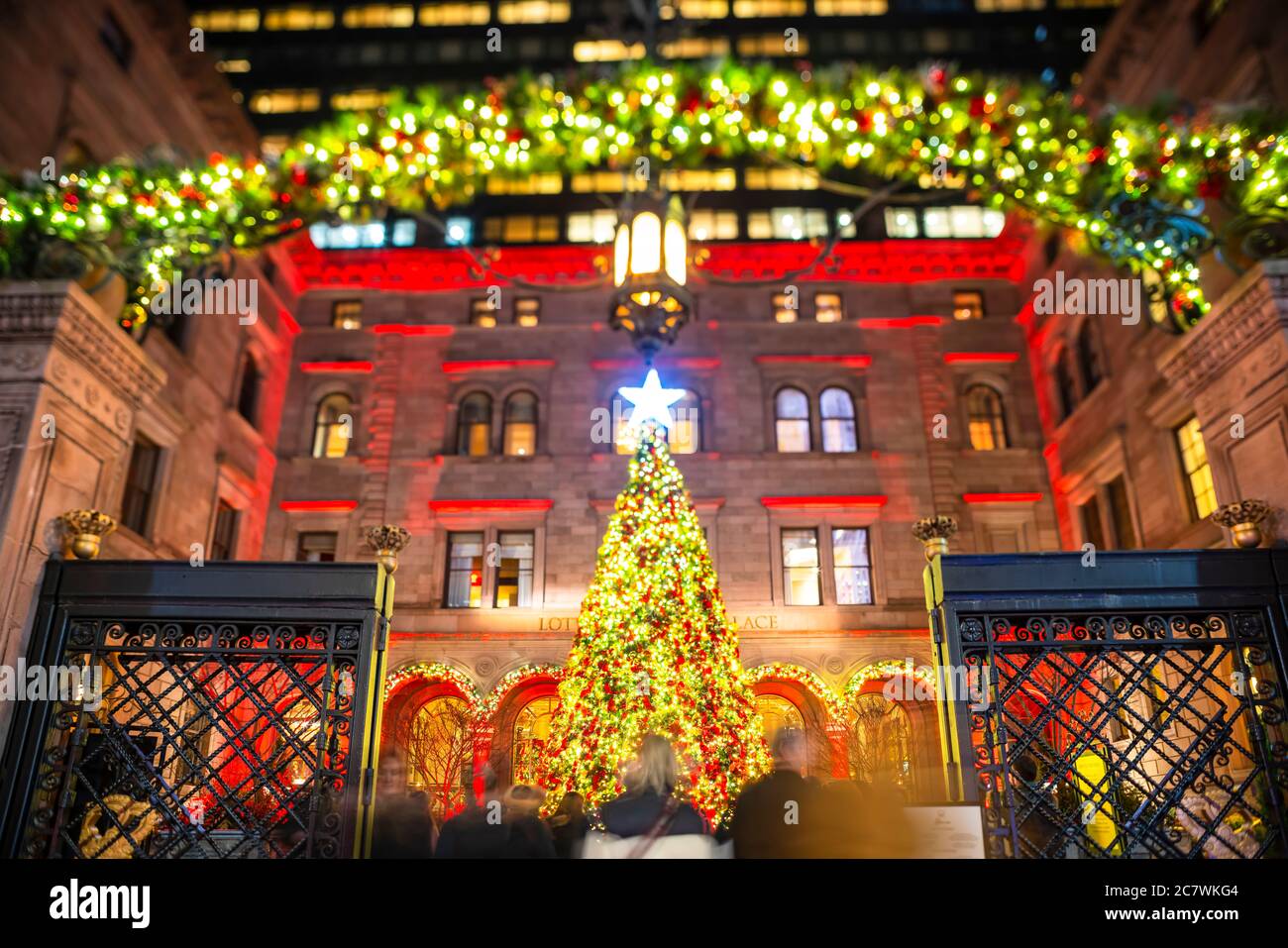 Christmas tree glows in the center courtyard of the New York Palace ...