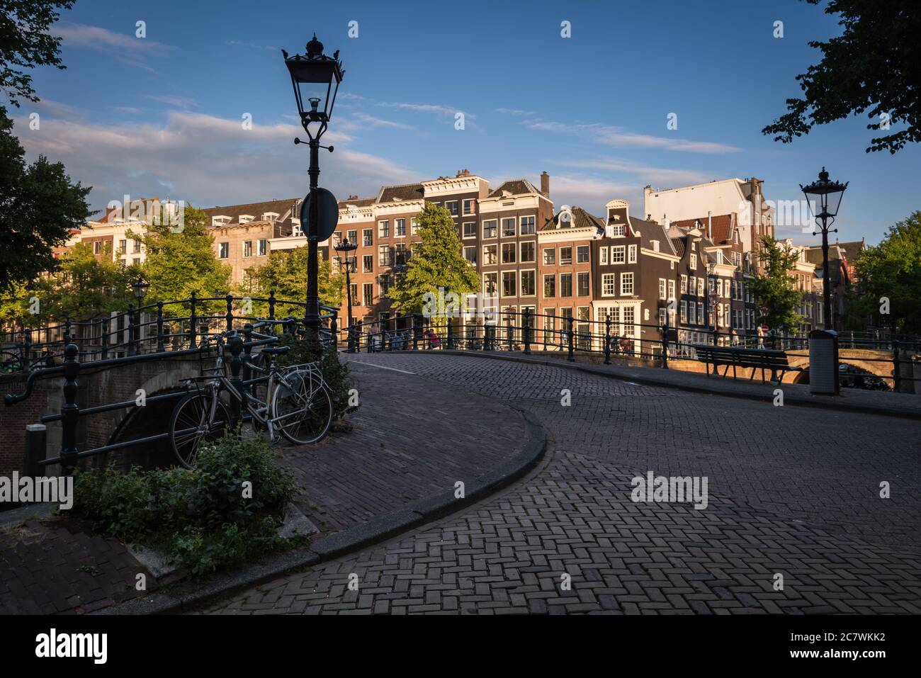 Amsterdam cityscape at sunset with typical dutch houses in the ...