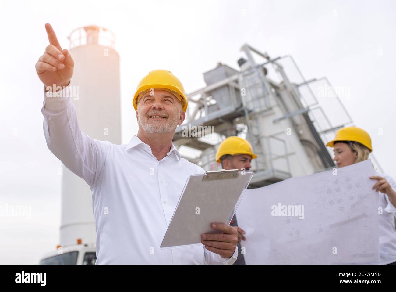 Low angle shot of a caucasian male engineer pointing his finger Stock ...