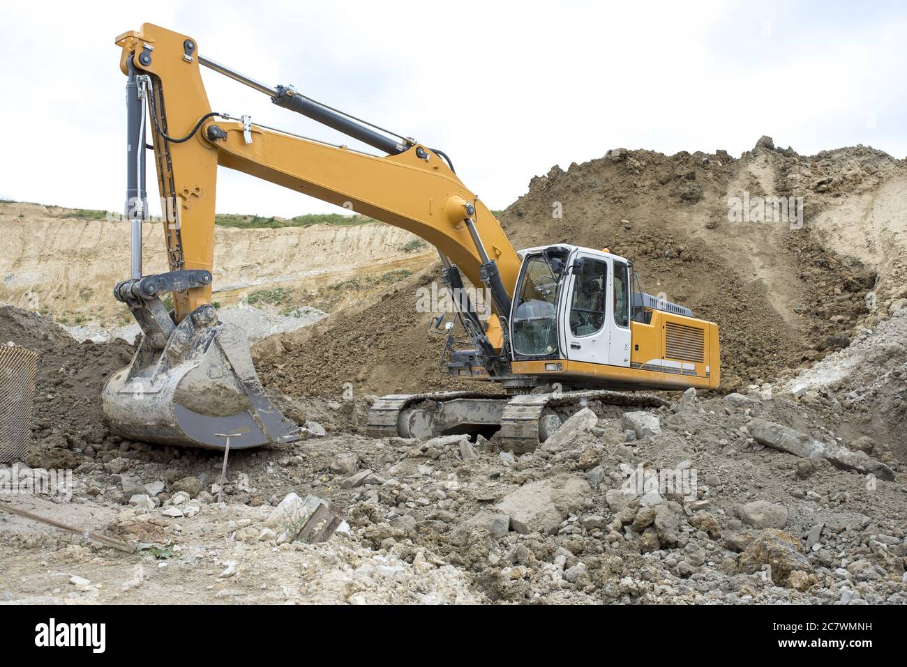 Crawler excavator working at the new construction site Stock Photo - Alamy