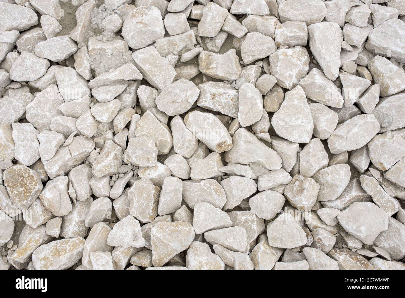Overhead of a pile of white limestone rocks - great for industrial ...