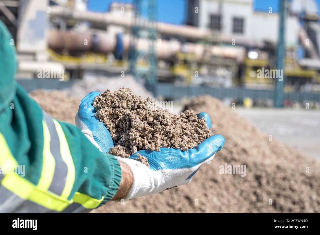 Person holding shredded paper used as an alternative fuel Stock Photo ...