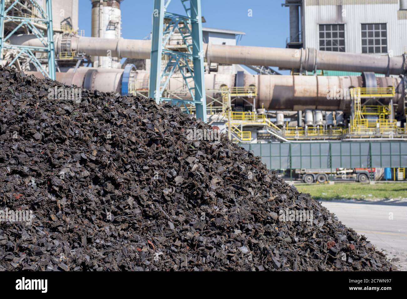 Pile of shredded tires used as alternative fuel in rotary kiln in ...