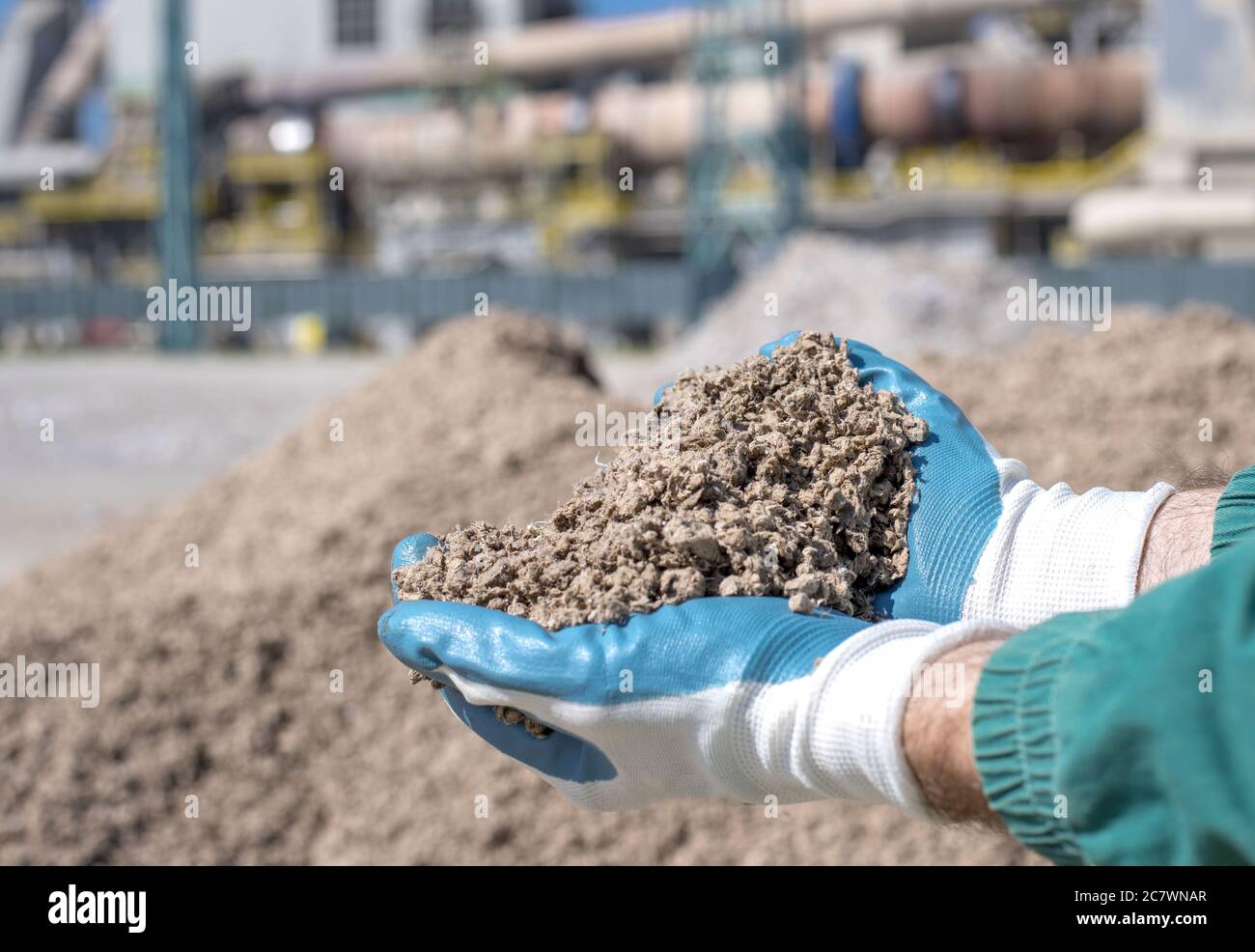 Person holding shredded paper used as an alternative fuel Stock Photo ...