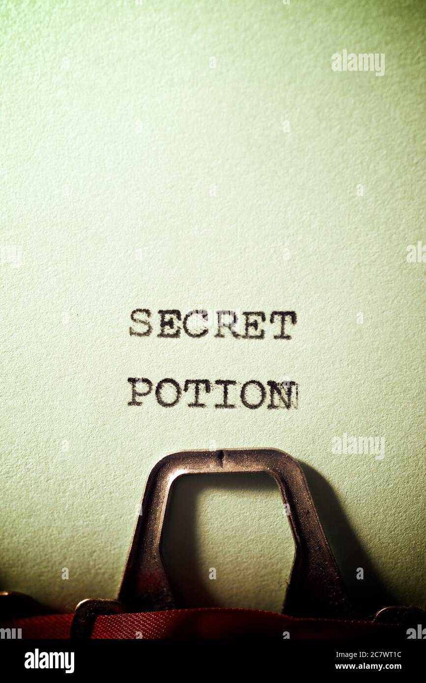 Secret potion text written with a typewriter Stock Photo - Alamy