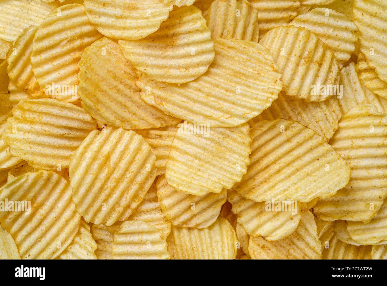 Crispy Potato Chips snack as background texture background. Empty space ...
