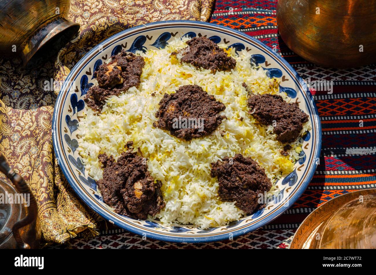 Traditional caucasian rice dish plov with meat Stock Photo - Alamy