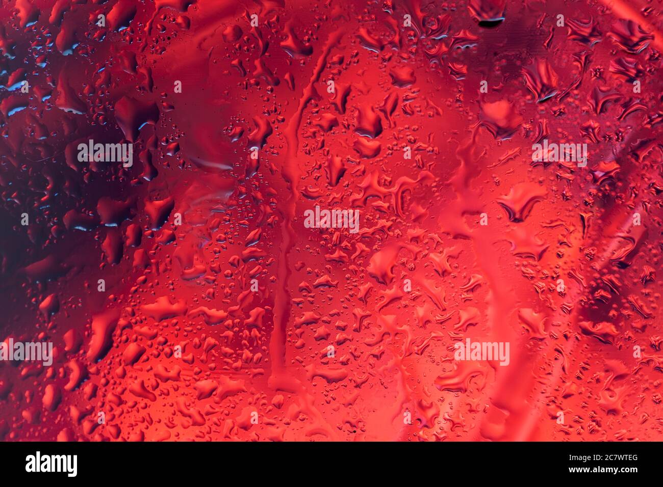 Abstract dark red background with raindrops on glass Stock Photo - Alamy