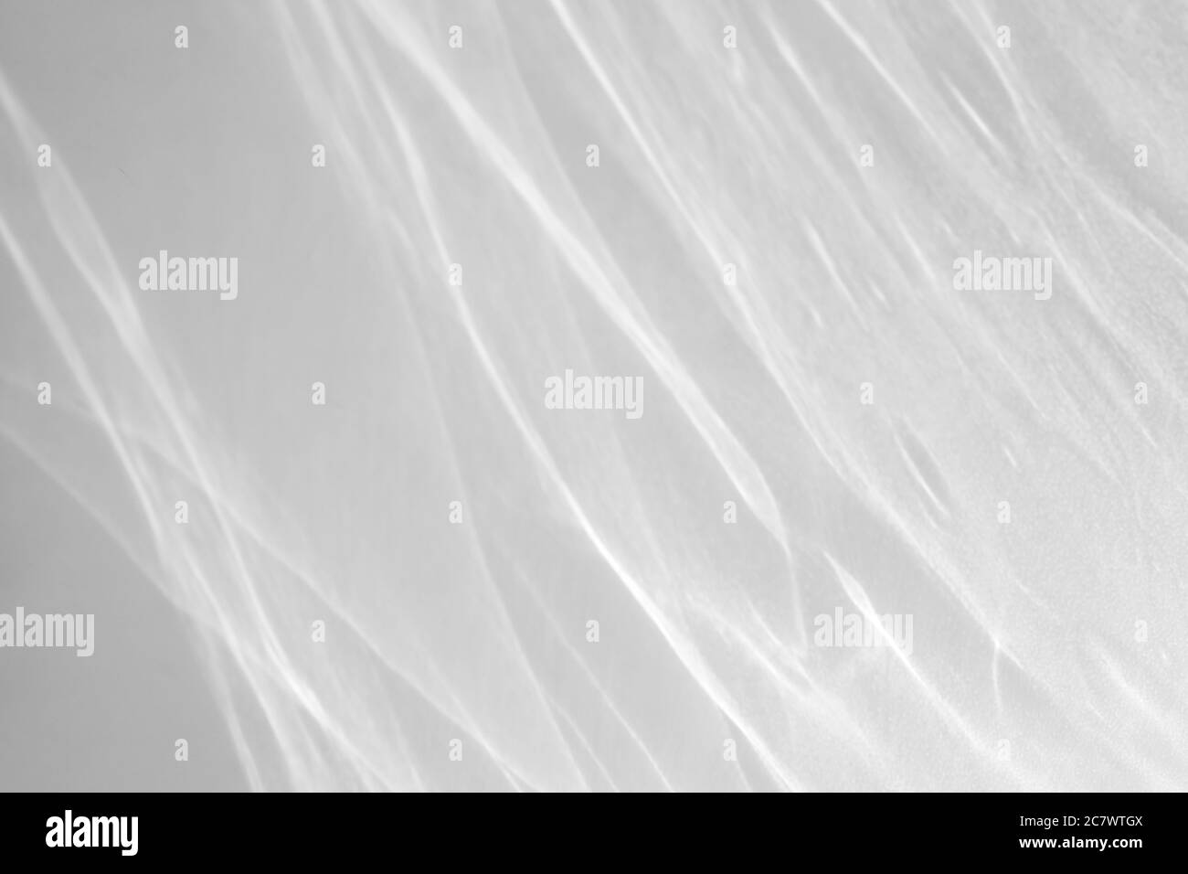 shadow and light caustic effect on a white wall Stock Photo - Alamy