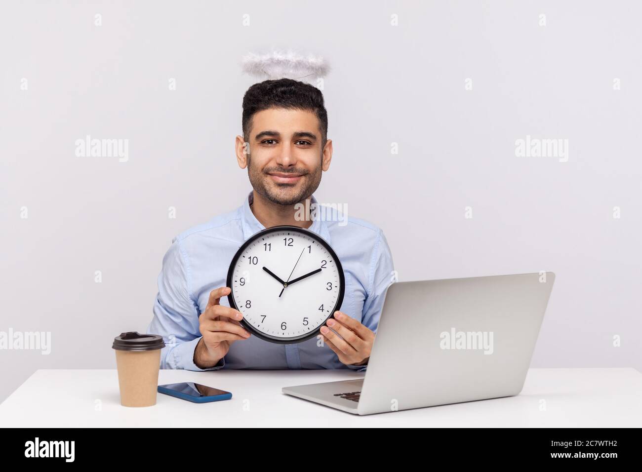 Time management. Positive punctual man employee with angelic nimbus ...