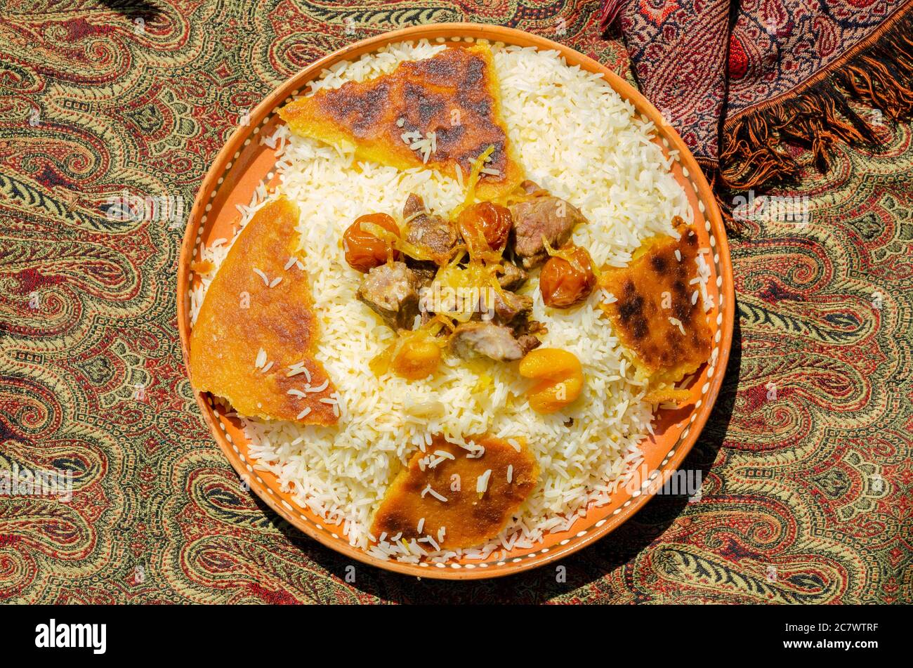 Traditional caucasian rice dish plov with dry fruits and meat Stock ...