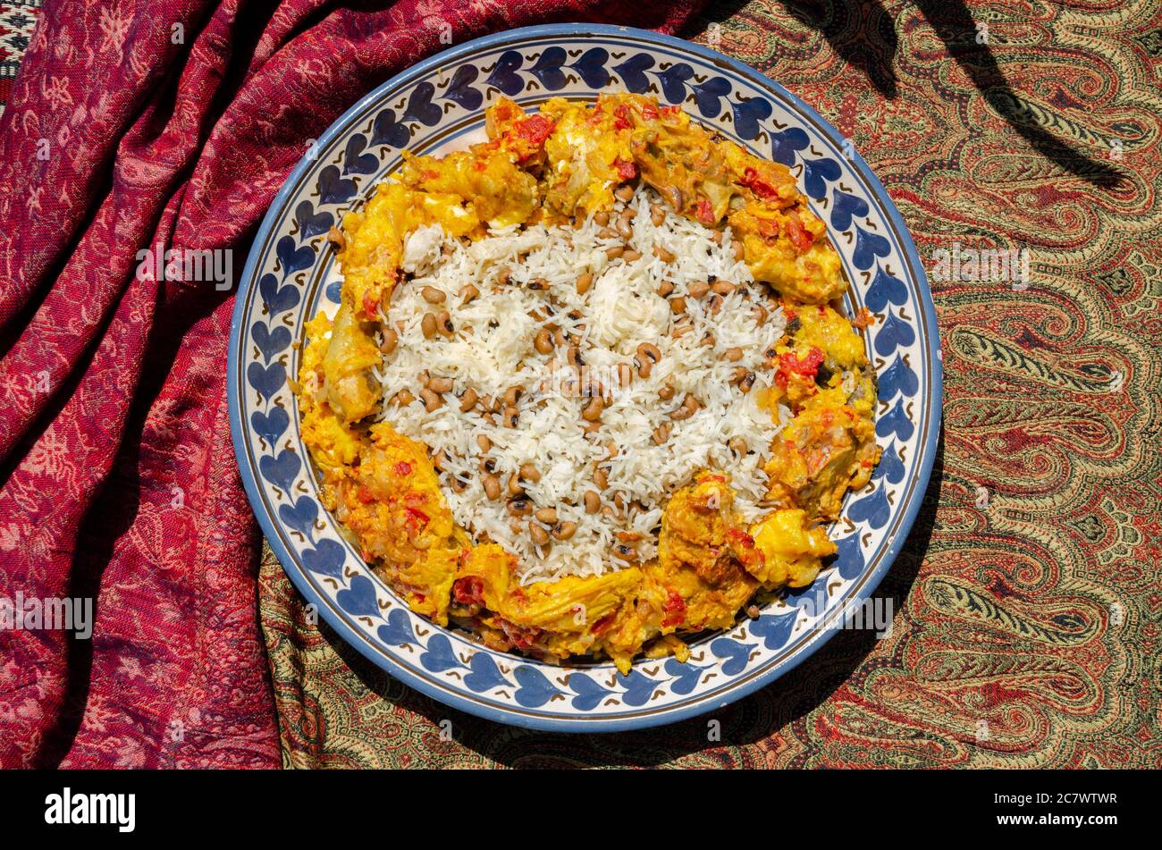 Traditional caucasian rice dish plov with omlette and lentils Stock ...